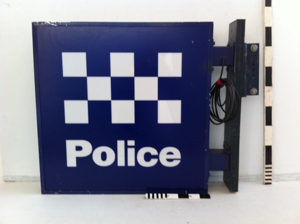 Lit police sign – PropCo